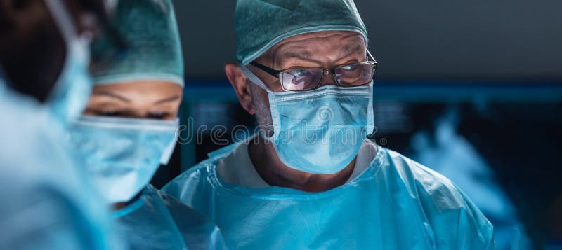 Team of Medical Doctors Performs Surgical Operation in Modern Operating ...