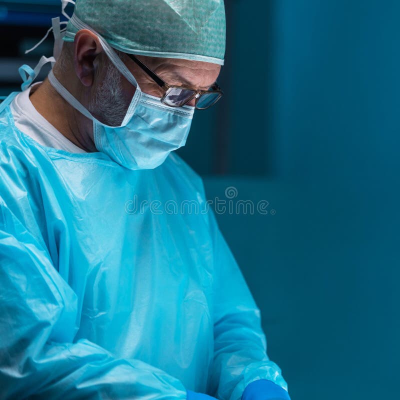 Team of Medical Doctors Performs Surgical Operation in Modern Operating ...