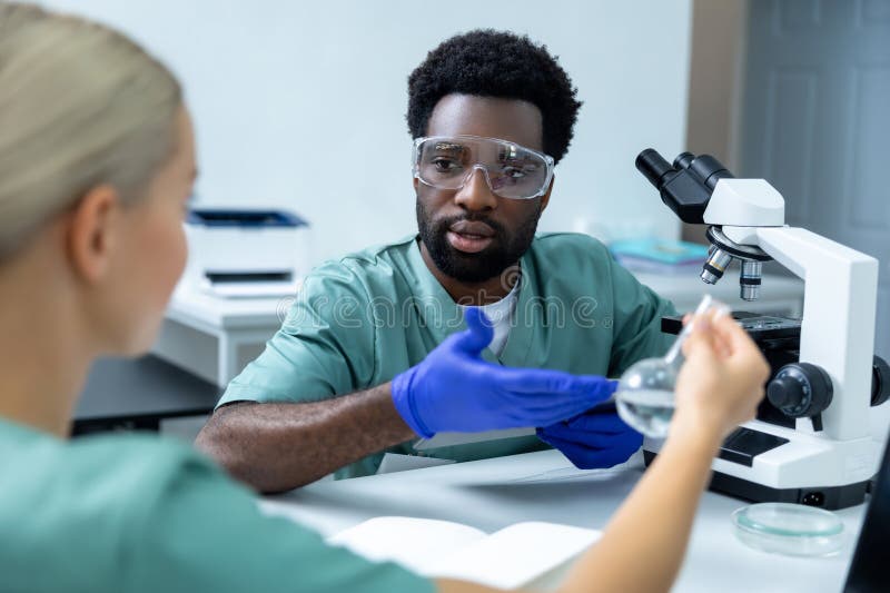 Diverse Team Professional Scientists Chemists Lab Using Equipment Stock ...