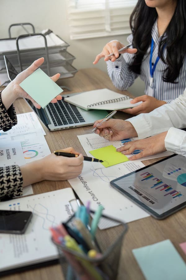 Dynamic Team Discussing Data Insights and Brainstorming Ideas with ...