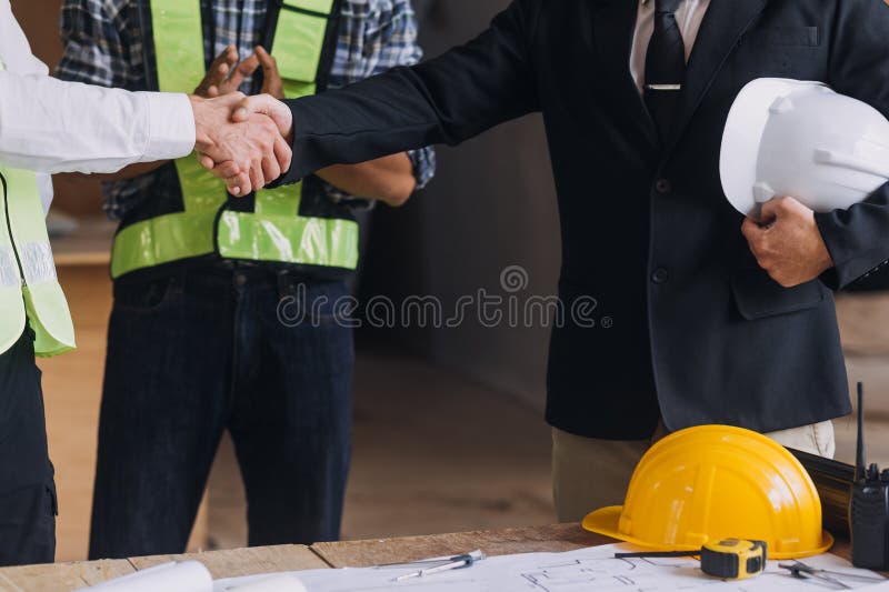 Diverse Team of Specialists Use Tablet Computer on Construction Site ...