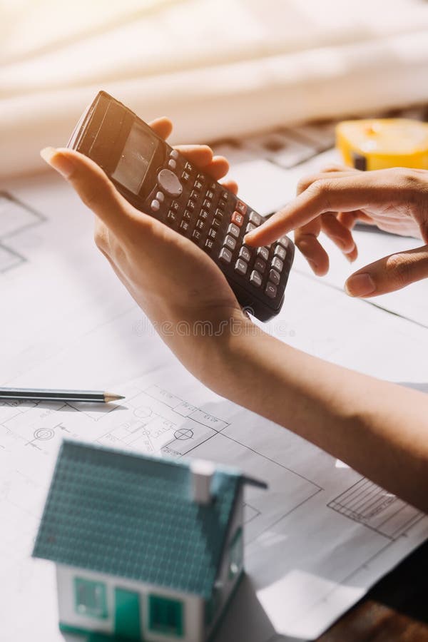 Diverse Team of Specialists Use Tablet Computer on Construction Site ...