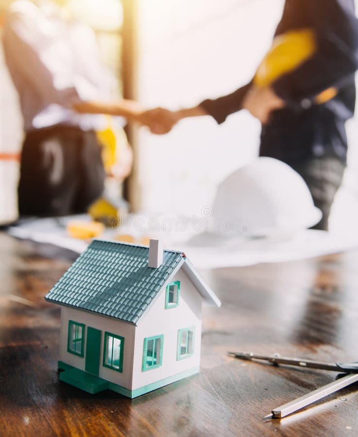 Diverse Team of Specialists Use Tablet Computer on Construction Site ...