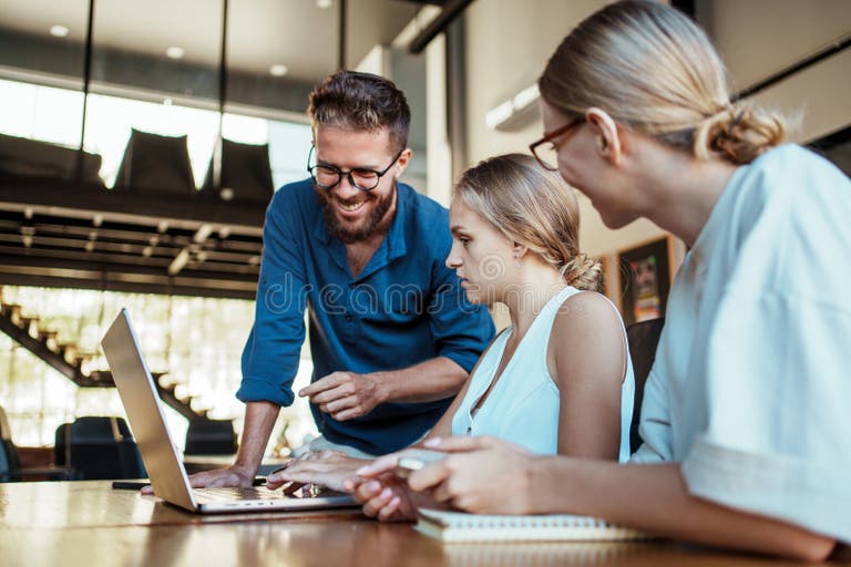 Participating in a Collaborative Team Meeting within a Modern Workspace ...
