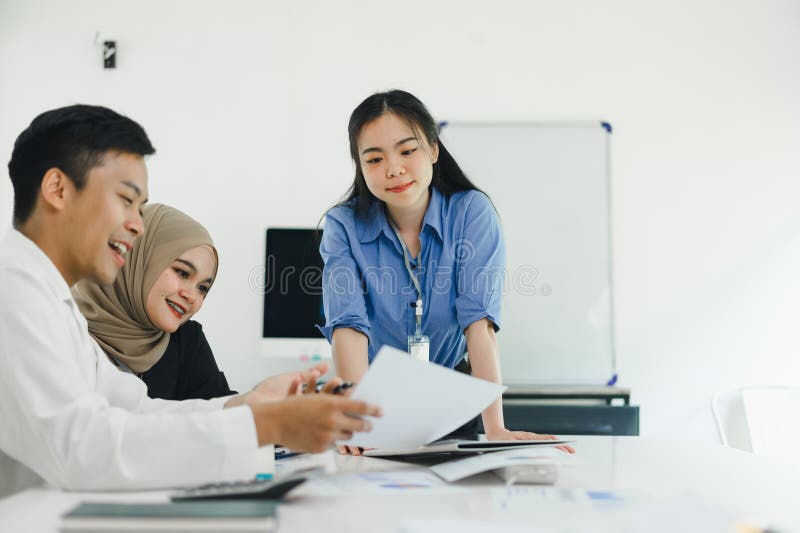 Diverse Team Working Together on Tablet in Modern Office. Stock Photo - Image of analyze ...