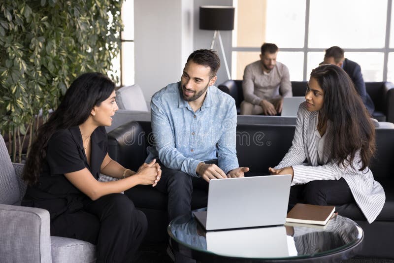 Diverse Team of Young Project Managers Discussing Work Tasks Stock ...