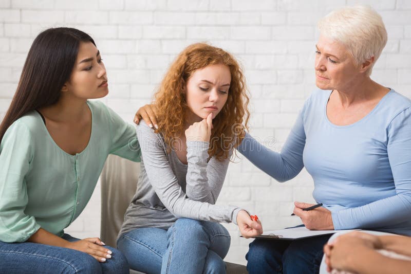 Diverse Women Supporting Depressed Girl Group Therapy Session Indoor ...
