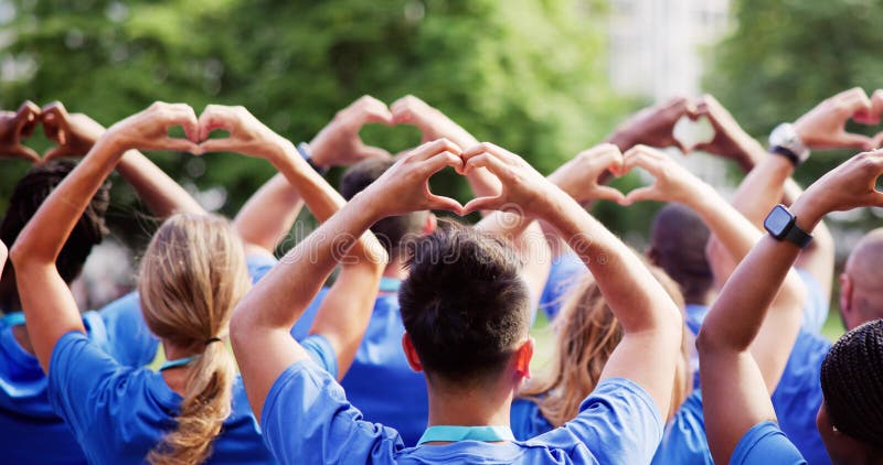 Diverse Young Charity Group Making Hearts Stock Photo - Image of hands ...