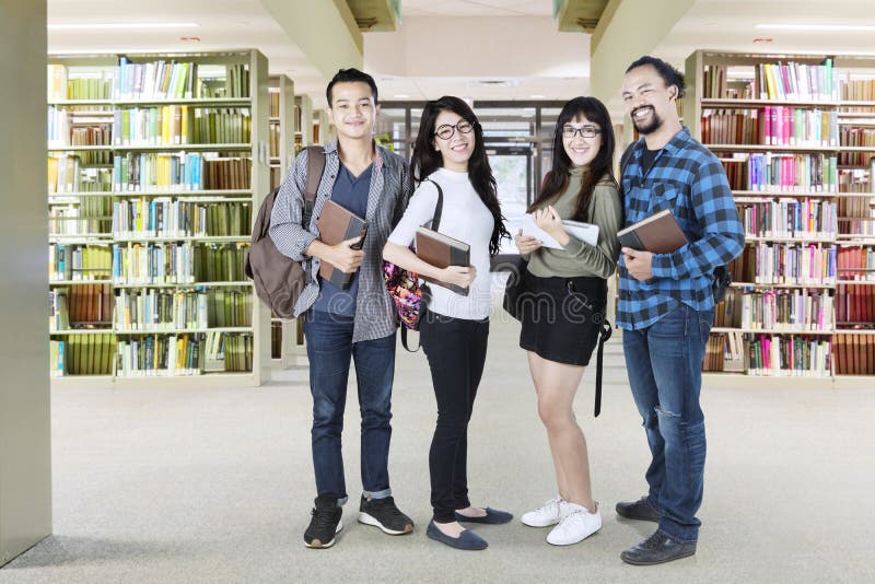 Diversity College Students Standing in the Library Stock Photo - Image ...