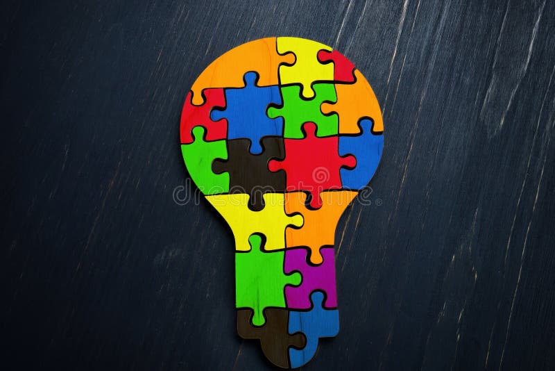 Diversity and Creativity Concept. Colored Pieces of the Puzzle in the ...