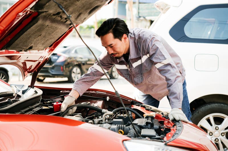 Diversity Mechanic Teamwork, a Japanese Engineer Wearing Blue Uniforms ...