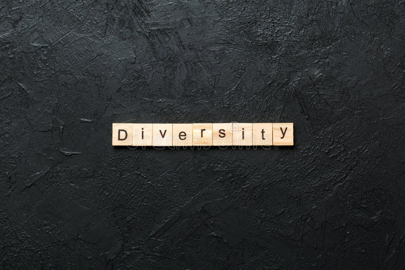 Diversity Word Written on Wood Block. Diversity Text on Cement Table ...
