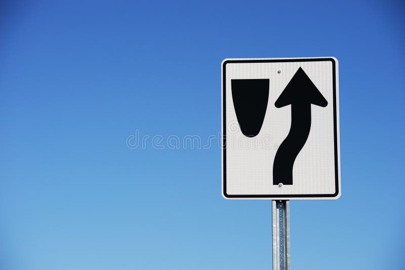 Divided Highway Sign Against Blue Sky Stock Image - Image of sign ...