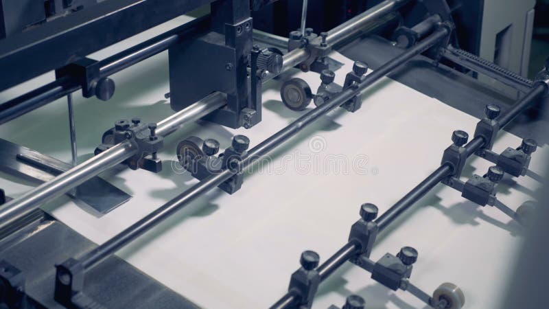 Paper Recycle Process. Paper Move on a Conveyor at a Print Office ...