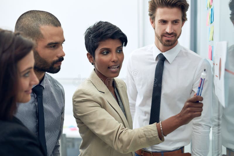 Dividing the Tasks To Multiply the Success. a Group of Colleagues ...