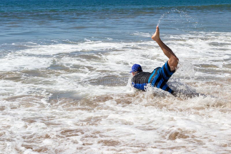 Diving in the beach stock image. Image of long, rays - 104861699