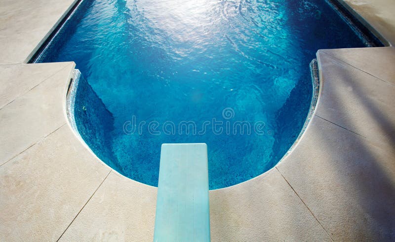 Diving Board View from Above and Blue Water of Swimming Pool Stock ...