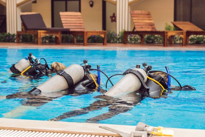 Diving Instructor and Students. Instructor Teaches Students To D Stock ...