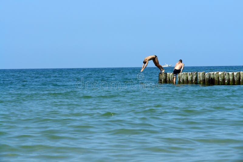 Diving off the pier stock image. Image of travel, adventure - 2179945