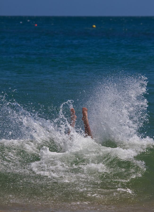 Diving Splash in the Sea stock image. Image of feet, dive - 12826463