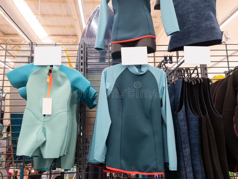 Diving suits in store stock image. Image of customer - 259634767