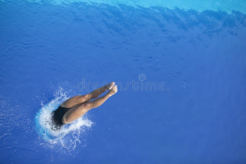 Diving into the water stock photo. Image of dive, legs - 28392042