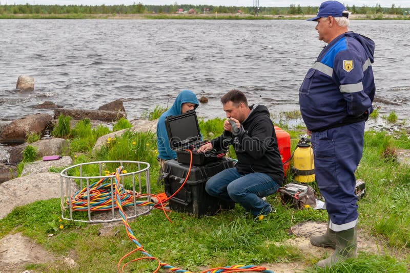Diving Work. on the Shore Support Group Monitors the Work of the Diver ...