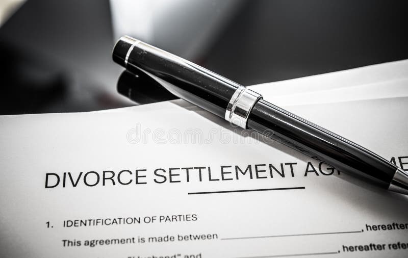 Divorce Settlement Agreement Document with Pen on Table, Legal ...