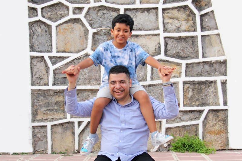 Divorced Dad With His 10 Year Old Latino Son Play And Spend Quality Time Together Celebrating