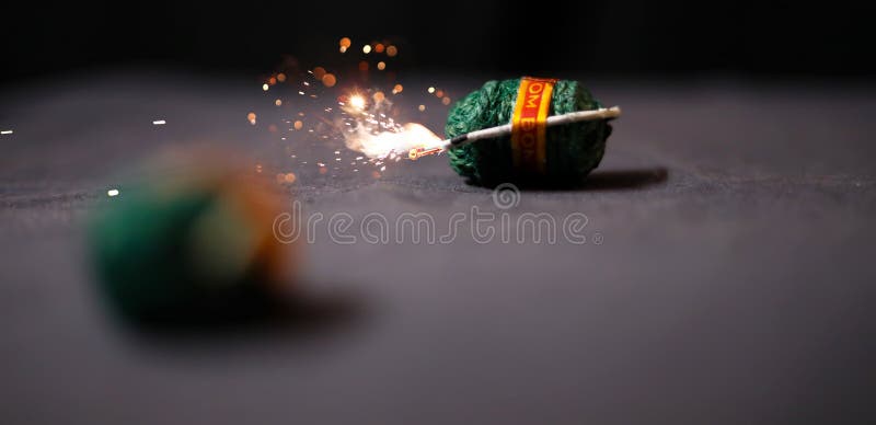Diwali Fire Bomb Cracker on Black Background Stock Image - Image of ...