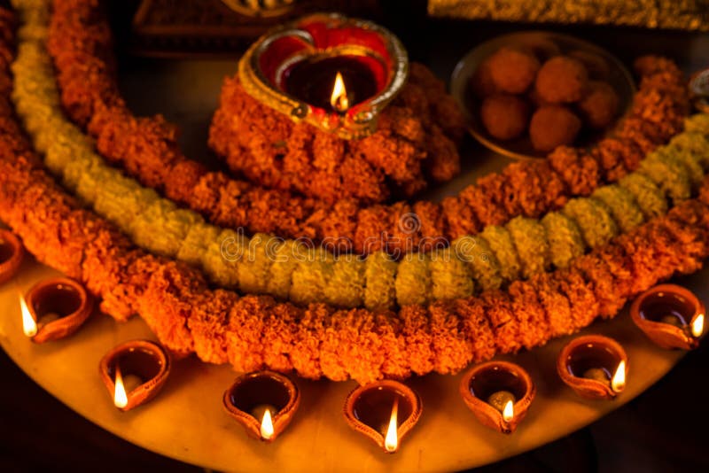Diwali Glowing Diya and Flowers Arranged in Circular Shape Forming a ...
