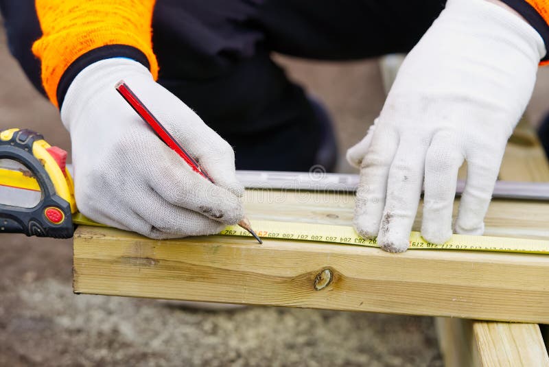 Diy Carpenter Marks a Piece of Wood. Carpenter& X27;s Hands in White ...