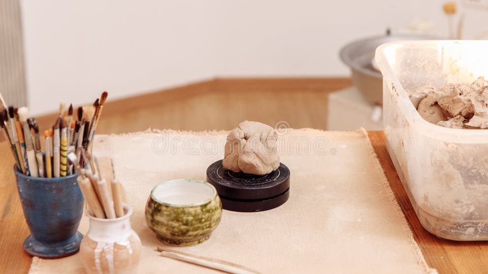 DIY Create a Cup of Clay by Hand Modeling. Step 2. Mash the Clay in ...