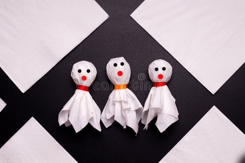 DIY Halloween Candy Ghost Step by Step. Image Four. Draw Ghosts Eyes ...