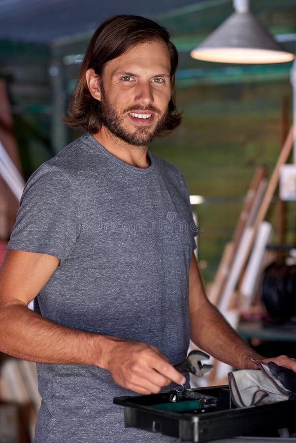 DIY man in his workshop stock image. Image of workshop - 60387659