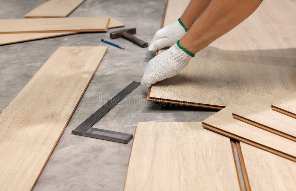 DIY Tips for Installing Interlocking Laminate Flooring Stock Image - Image of costeffective ...