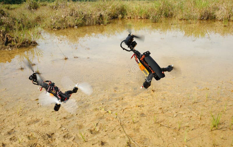 DIY Tricopter Drone Flying, Low Pass Above the Grass Field Stock Photo ...