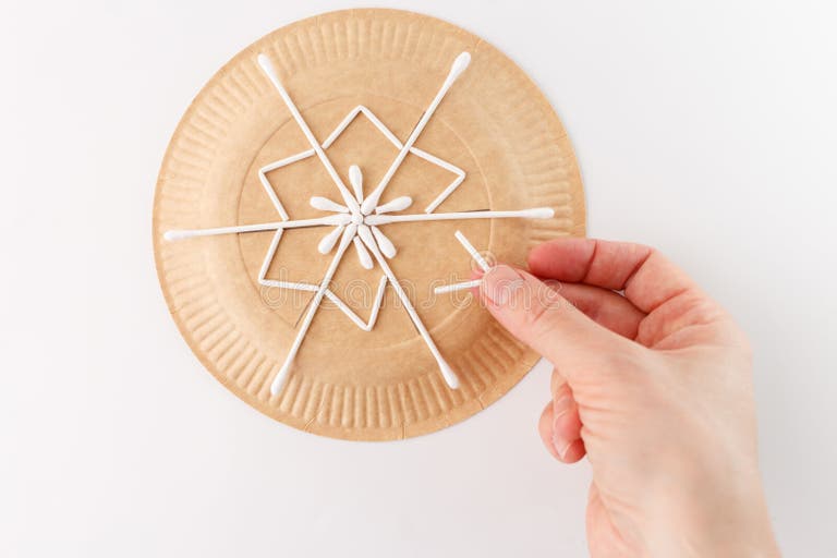DIY Tutorial Showing How To Create a Snowflake Decoration Using a Paper ...