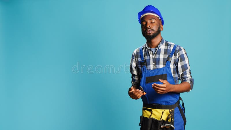 Dizzy Construction Worker Feeling Light Headed in Studio Stock Photo ...