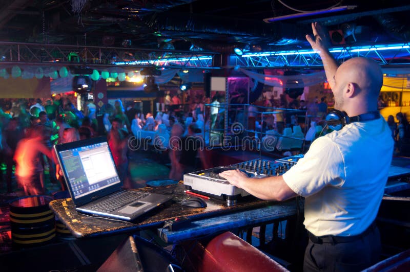 DJ Behind the Control Panel Stock Image - Image of control, crowd: 25148559