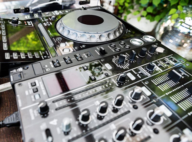 DJ CD player and mixer stock image. Image of channels - 37385857
