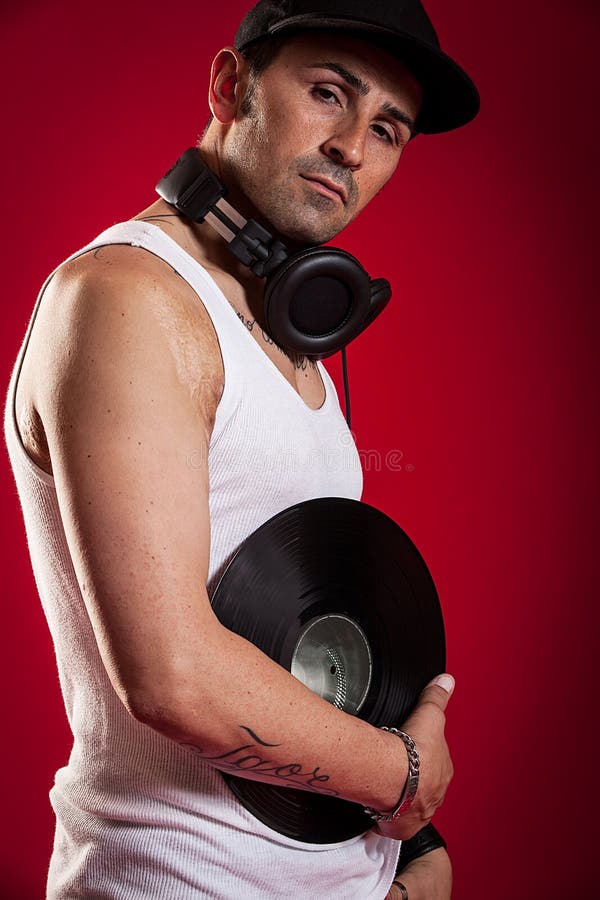 DJ in Front of a Red Background Stock Photo - Image of disk, adult ...