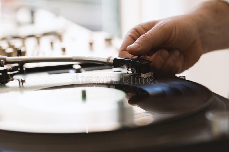 DJ Hand Adjusting a Needle on a Vinyl Record Stock Image - Image of ...