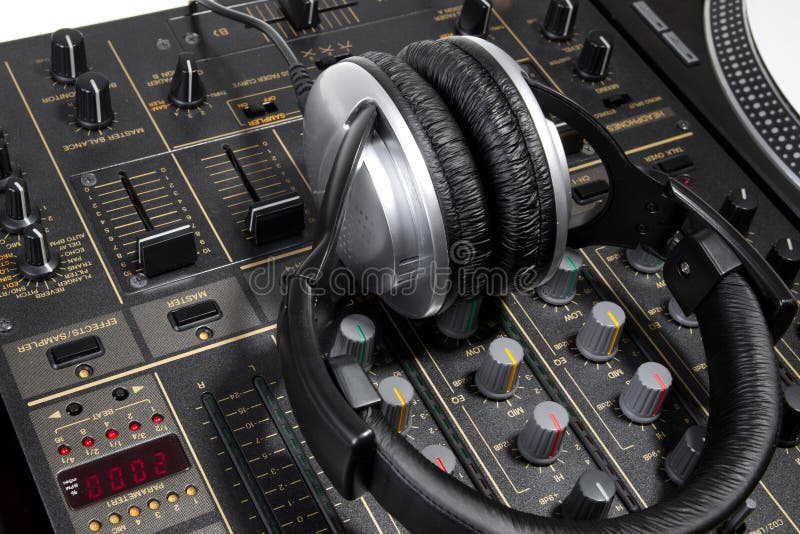Dj headphones on mixer stock photo. Image of regulators - 26476734