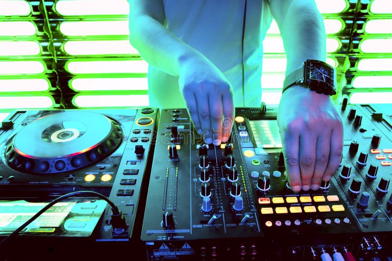 Dj mixes the track stock photo. Image of nightclub, dance - 19492318
