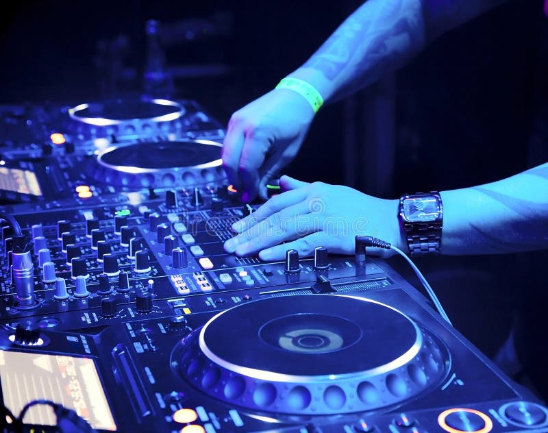 Dj mixes the track stock photo. Image of level, motion - 23558736
