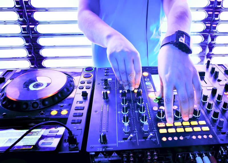 Dj mixes the track stock image. Image of electronics - 23558745