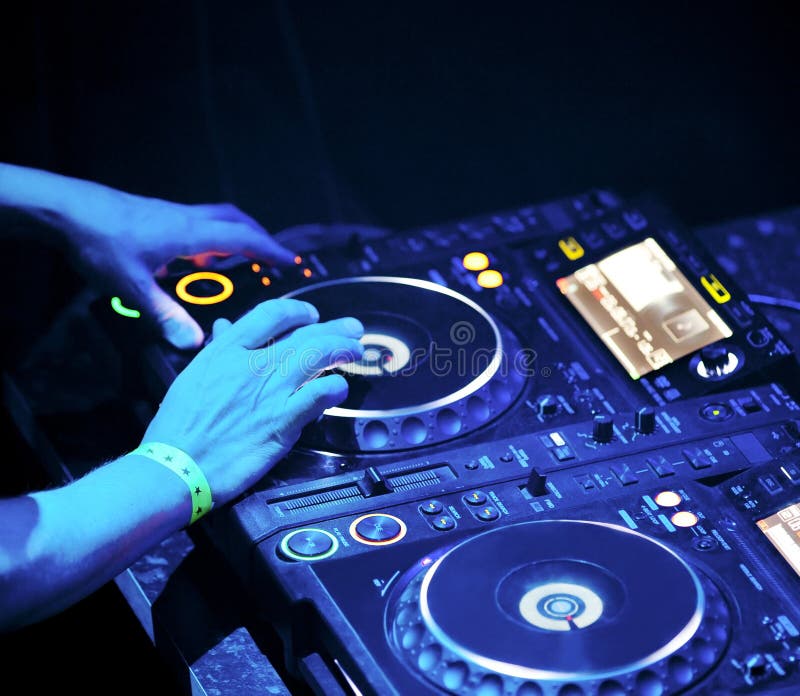 Dj mixes the track stock photo. Image of nightclub, equipment - 24404668