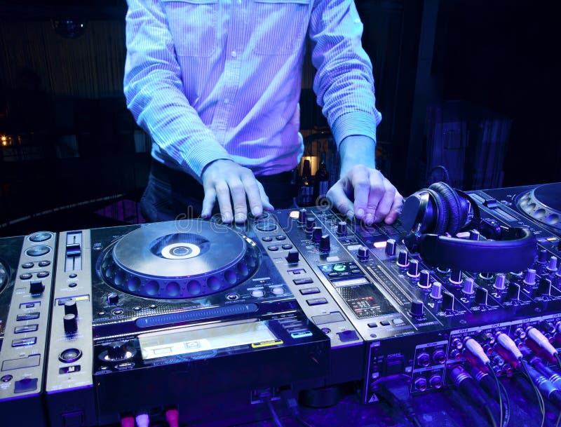 Dj mixes the track stock photo. Image of disco, evening - 25168558