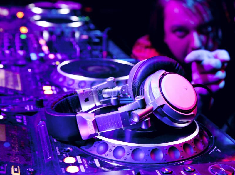 Dj mixes the track stock image. Image of mixing, electronics - 27221361